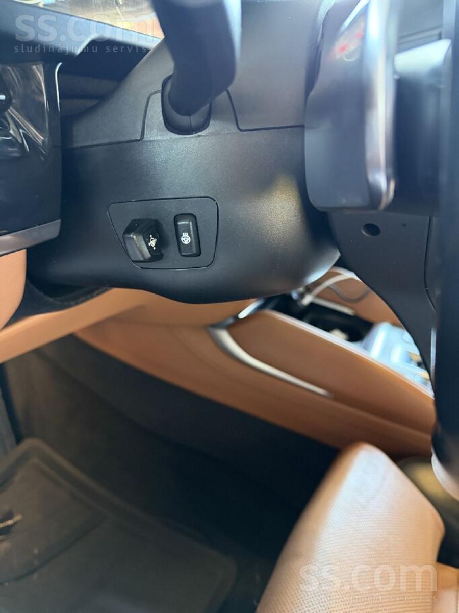 Black BMW X6 2015 in Riga, with an engine capacity of 3.00 L and mileage of 0 thousand km for 21500 €, photo 16 on AUTOMOTO.COM.LV
