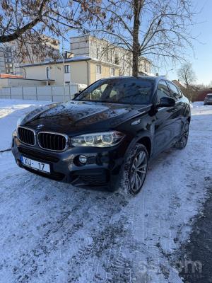 Black BMW X6 2015 in Riga, with an engine capacity of 3.00 L and mileage of 0 thousand km for 21500 €, photo 17 on AUTOMOTO.COM.LV