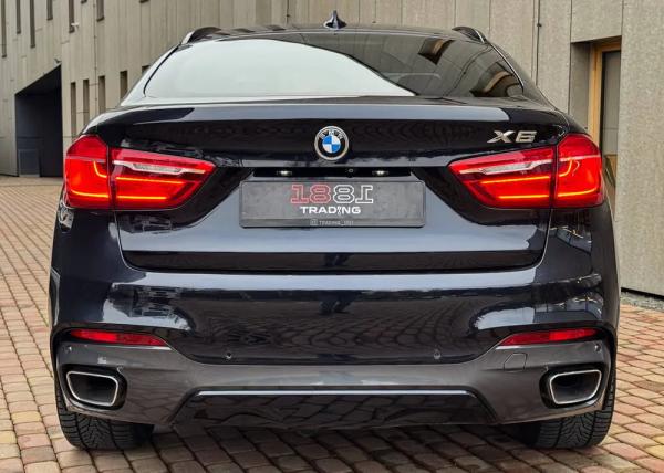 Black BMW X6 2015 in Riga, with an engine capacity of 3.00 L and mileage of 188 thousand km for 20200 €, photo 6 on AUTOMOTO.COM.LV