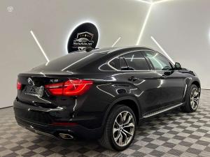 Black BMW X6 2015 in Marijampole, with an engine capacity of 2.99 L and mileage of 175 thousand km for 23450 €, photo 30 on AUTOMOTO.COM.LV