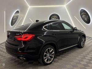 Black BMW X6 2015 in Marijampole, with an engine capacity of 2.99 L and mileage of 175 thousand km for 23450 €, photo 31 on AUTOMOTO.COM.LV