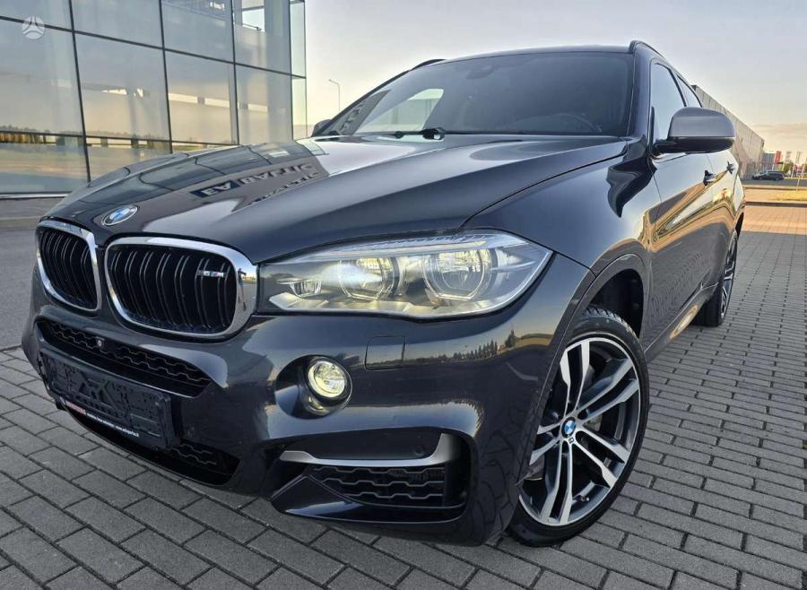 Black BMW X6 2015 in Panevezys, with an engine capacity of 2.99 L and mileage of 313 thousand km for 22999 €, photo 1 on AUTOMOTO.COM.LV