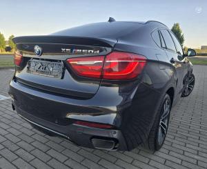 Black BMW X6 2015 in Panevezys, with an engine capacity of 2.99 L and mileage of 313 thousand km for 22999 €, photo 3 on AUTOMOTO.COM.LV