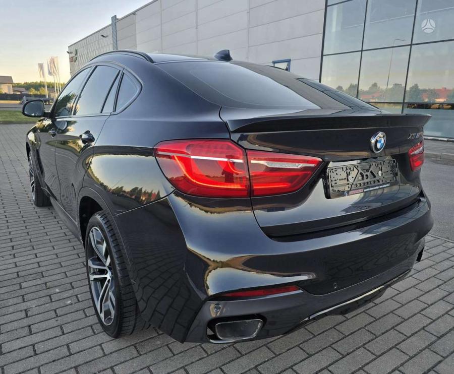 Black BMW X6 2015 in Panevezys, with an engine capacity of 2.99 L and mileage of 313 thousand km for 22999 €, photo 5 on AUTOMOTO.COM.LV