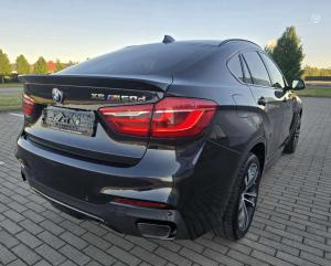 Black BMW X6 2015 in Panevezys, with an engine capacity of 2.99 L and mileage of 313 thousand km for 22999 €, photo 7 on AUTOMOTO.COM.LV