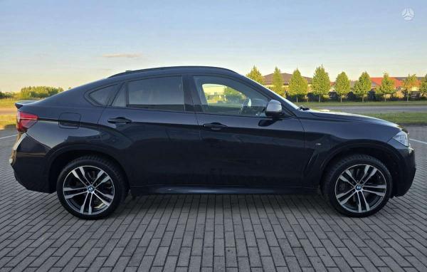 Black BMW X6 2015 in Panevezys, with an engine capacity of 2.99 L and mileage of 313 thousand km for 22999 €, photo 7 on AUTOMOTO.COM.LV