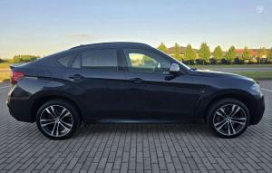 Black BMW X6 2015 in Panevezys, with an engine capacity of 2.99 L and mileage of 313 thousand km for 22999 €, photo 8 on AUTOMOTO.COM.LV