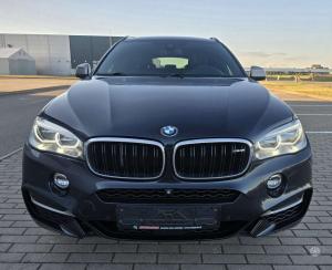 Black BMW X6 2015 in Panevezys, with an engine capacity of 2.99 L and mileage of 313 thousand km for 22999 €, photo 10 on AUTOMOTO.COM.LV