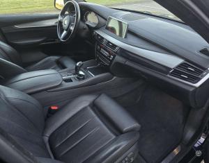 Black BMW X6 2015 in Panevezys, with an engine capacity of 2.99 L and mileage of 313 thousand km for 22999 €, photo 13 on AUTOMOTO.COM.LV