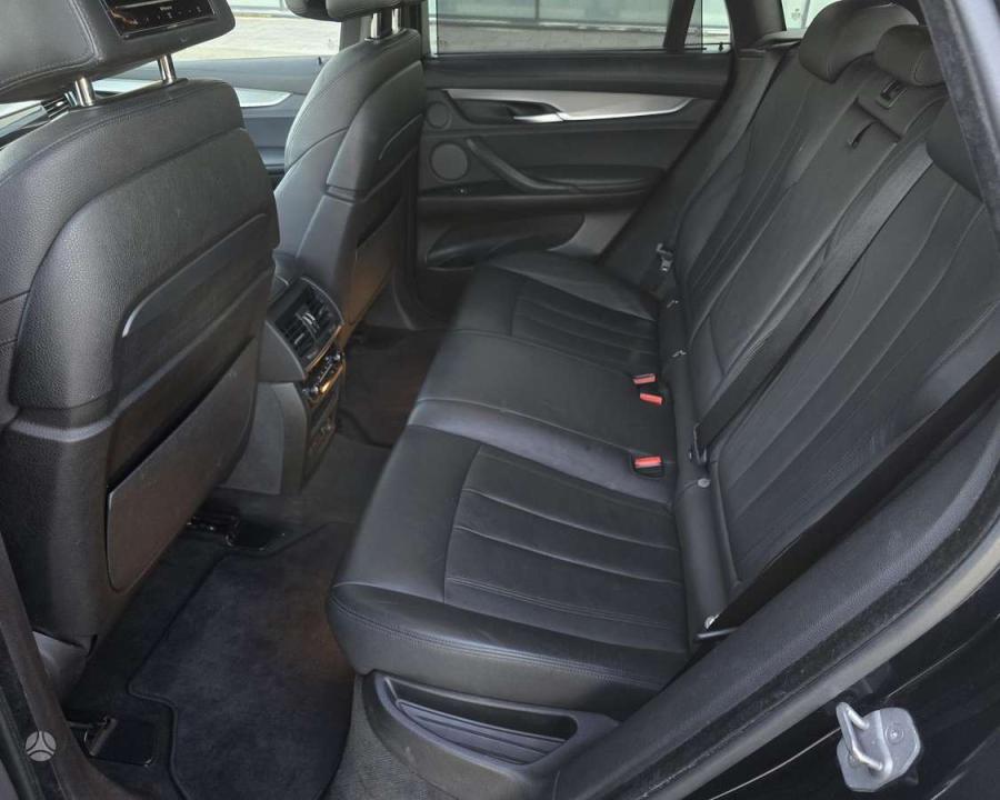 Black BMW X6 2015 in Panevezys, with an engine capacity of 2.99 L and mileage of 313 thousand km for 22999 €, photo 20 on AUTOMOTO.COM.LV