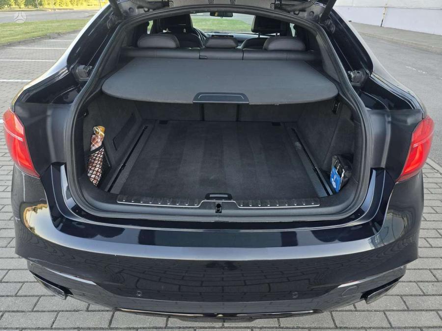 Black BMW X6 2015 in Panevezys, with an engine capacity of 2.99 L and mileage of 313 thousand km for 22999 €, photo 40 on AUTOMOTO.COM.LV