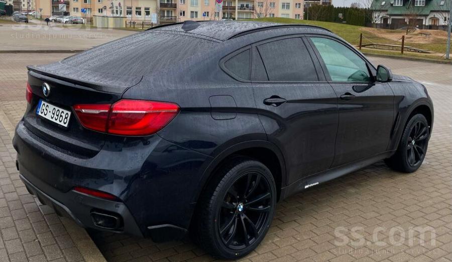 Black BMW X6 2015 in Riga, with an engine capacity of 3.00 L and mileage of 211 thousand km for 22300 €, photo 4 on AUTOMOTO.COM.LV