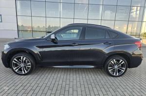 Black BMW X6 2015 in Panevezys, with an engine capacity of 2.99 L and mileage of 313 thousand km for 20499 €, photo 4 on AUTOMOTO.COM.LV