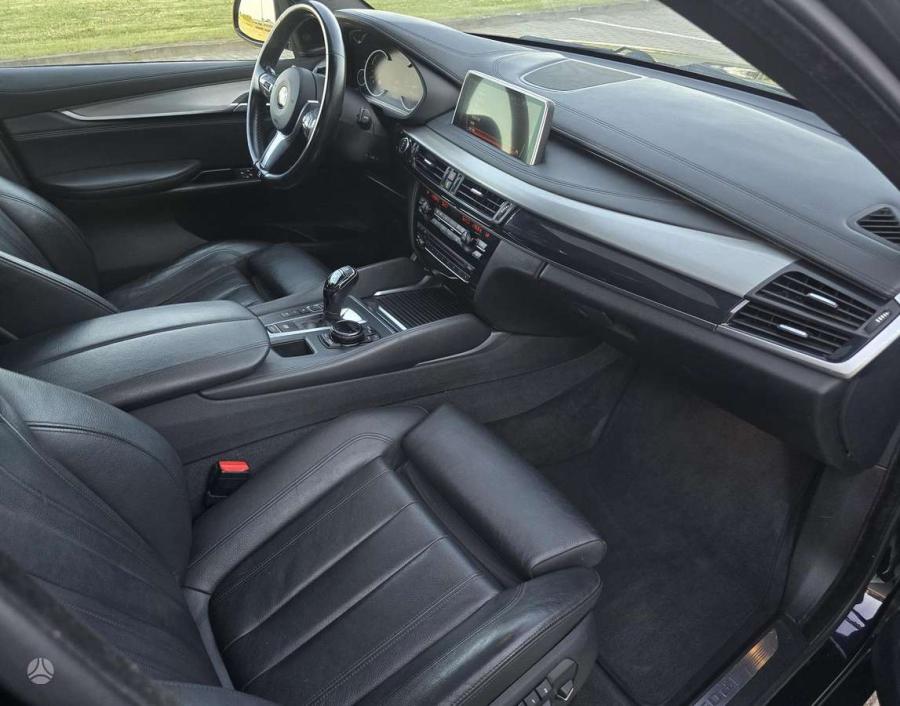 Black BMW X6 2015 in Panevezys, with an engine capacity of 2.99 L and mileage of 313 thousand km for 20499 €, photo 13 on AUTOMOTO.COM.LV