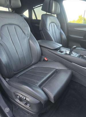 Black BMW X6 2015 in Panevezys, with an engine capacity of 2.99 L and mileage of 313 thousand km for 20499 €, photo 15 on AUTOMOTO.COM.LV