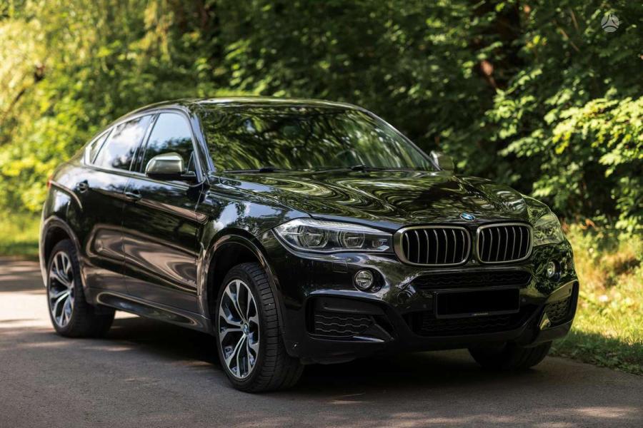 Black BMW X6 2015 in Siauliai, with an engine capacity of 2.99 L and mileage of 252 thousand km for 23500 €, photo 1 on AUTOMOTO.COM.LV