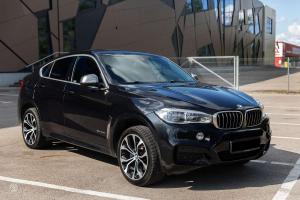 Black BMW X6 2015 in Siauliai, with an engine capacity of 2.99 L and mileage of 252 thousand km for 23500 €, photo 8 on AUTOMOTO.COM.LV