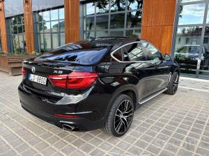 Black BMW X6 2015 in Riga, with an engine capacity of 3.00 L and mileage of 221 thousand km for 23900 €, photo 7 on AUTOMOTO.COM.LV