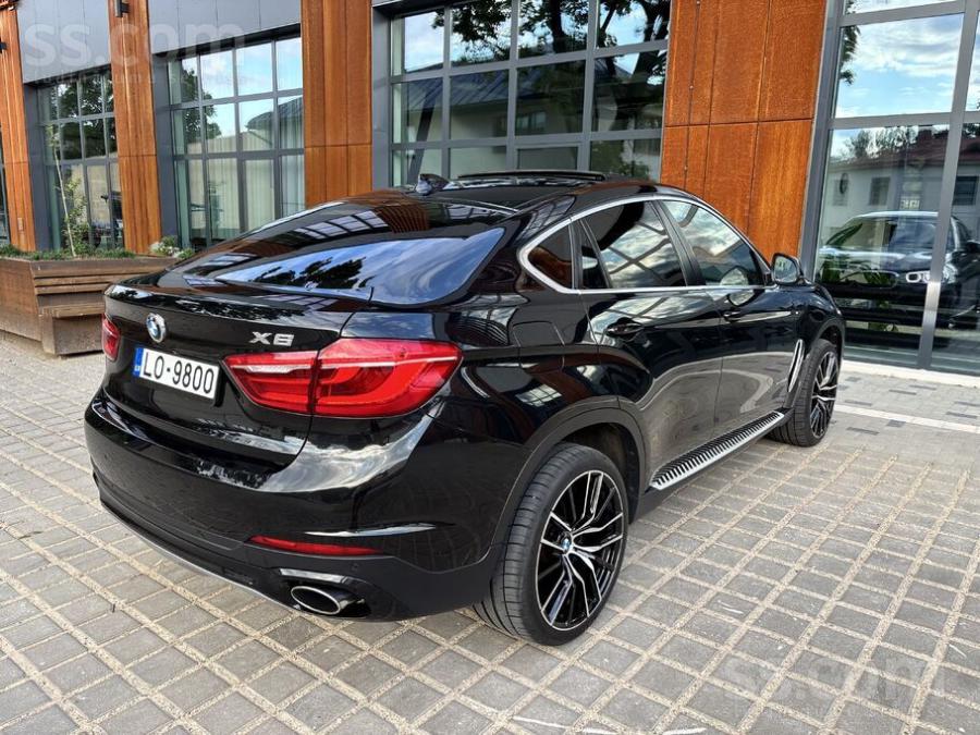 Black BMW X6 2015 in Riga, with an engine capacity of 3.00 L and mileage of 221 thousand km for 23900 €, photo 7 on AUTOMOTO.COM.LV