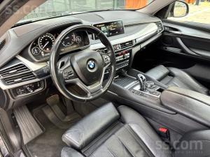Black BMW X6 2015 in Riga, with an engine capacity of 3.00 L and mileage of 221 thousand km for 23900 €, photo 8 on AUTOMOTO.COM.LV
