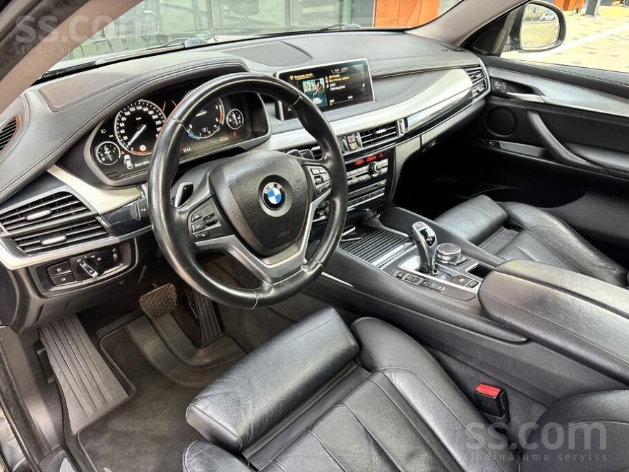 Black BMW X6 2015 in Riga, with an engine capacity of 3.00 L and mileage of 221 thousand km for 23900 €, photo 8 on AUTOMOTO.COM.LV