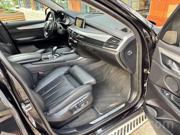 Black BMW X6 2015 in Riga, with an engine capacity of 3.00 L and mileage of 221 thousand km for 23900 €, photo 9 on AUTOMOTO.COM.LV