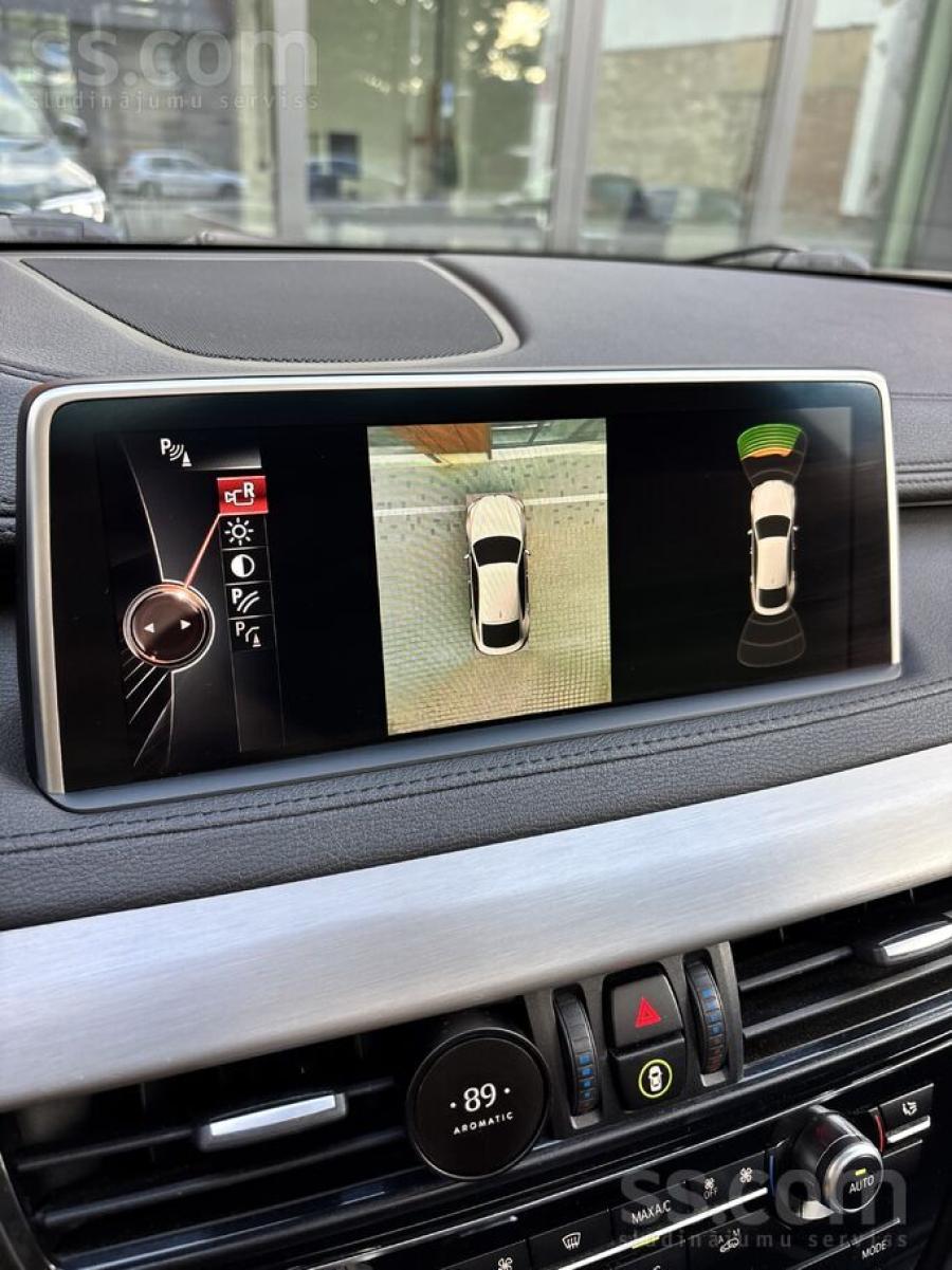Black BMW X6 2015 in Riga, with an engine capacity of 3.00 L and mileage of 221 thousand km for 23900 €, photo 11 on AUTOMOTO.COM.LV
