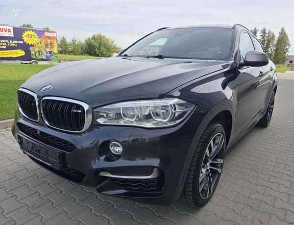 Black BMW X6 2015 in Panevezys, with an engine capacity of 2.99 L and mileage of 313 thousand km for 18999 €, photo 8 on AUTOMOTO.COM.LV