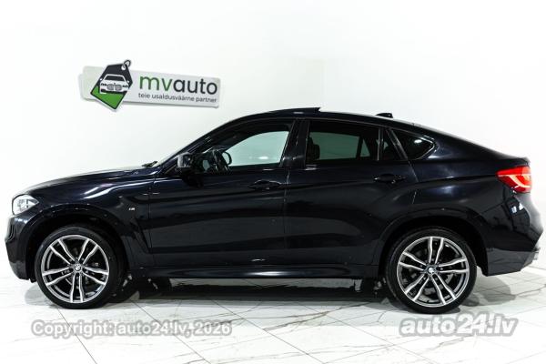 BMW X6 2015 Tallina vietnē Melns BMW X6 2015 Tallina, ar dzinēja tilpumu 3.00 L un nobraukumu 180 tūkst. km par 25990 €, foto 10 vietnē AUTOMOTO.COM.LV