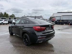 Black BMW X6 2015 in Marijampole, with an engine capacity of 2.99 L and mileage of 180 thousand km for 25500 €, photo 4 on AUTOMOTO.COM.LV