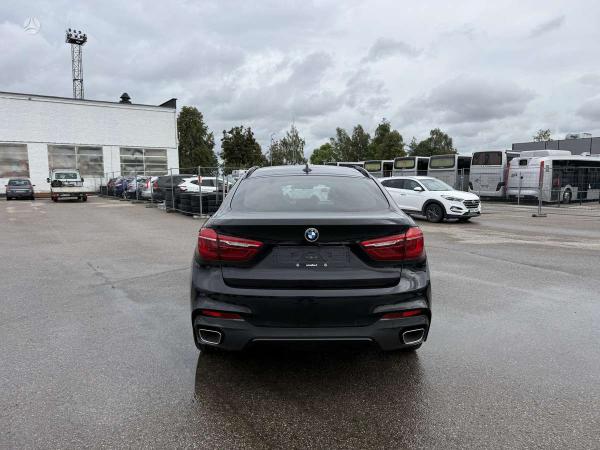 BMW X6 2015 in Marijampole on AUTOMOTO.COM.LV Black BMW X6 2015 in Marijampole, with an engine capacity of 2.99 L and mileage of 180 thousand km for 25500 €, photo 6 on AUTOMOTO.COM.LV
