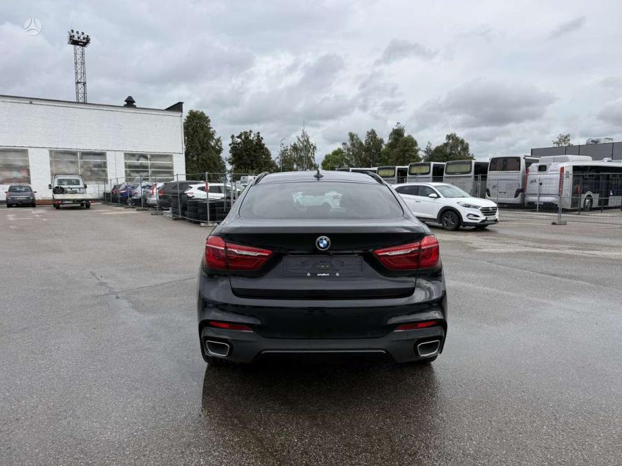 Black BMW X6 2015 in Marijampole, with an engine capacity of 2.99 L and mileage of 180 thousand km for 25500 €, photo 6 on AUTOMOTO.COM.LV