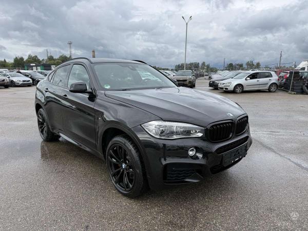 BMW X6 2015 in Marijampole on AUTOMOTO.COM.LV Black BMW X6 2015 in Marijampole, with an engine capacity of 2.99 L and mileage of 180 thousand km for 25500 €, photo 7 on AUTOMOTO.COM.LV