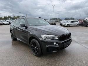 Black BMW X6 2015 in Marijampole, with an engine capacity of 2.99 L and mileage of 180 thousand km for 25500 €, photo 7 on AUTOMOTO.COM.LV