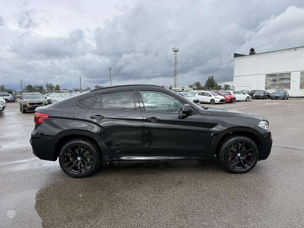 BMW X6 2015 in Marijampole on AUTOMOTO.COM.LV Black BMW X6 2015 in Marijampole, with an engine capacity of 2.99 L and mileage of 180 thousand km for 25500 €, photo 8 on AUTOMOTO.COM.LV
