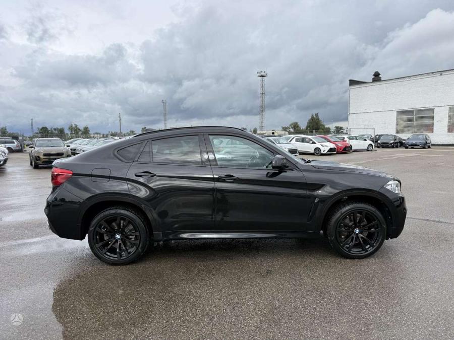 Black BMW X6 2015 in Marijampole, with an engine capacity of 2.99 L and mileage of 180 thousand km for 25500 €, photo 8 on AUTOMOTO.COM.LV
