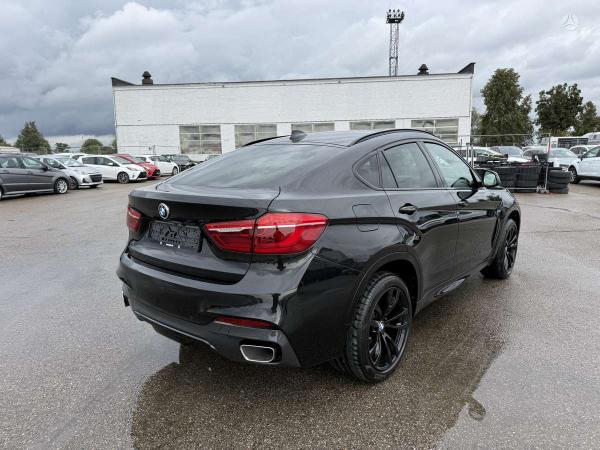 BMW X6 2015 in Marijampole on AUTOMOTO.COM.LV Black BMW X6 2015 in Marijampole, with an engine capacity of 2.99 L and mileage of 180 thousand km for 25500 €, photo 9 on AUTOMOTO.COM.LV
