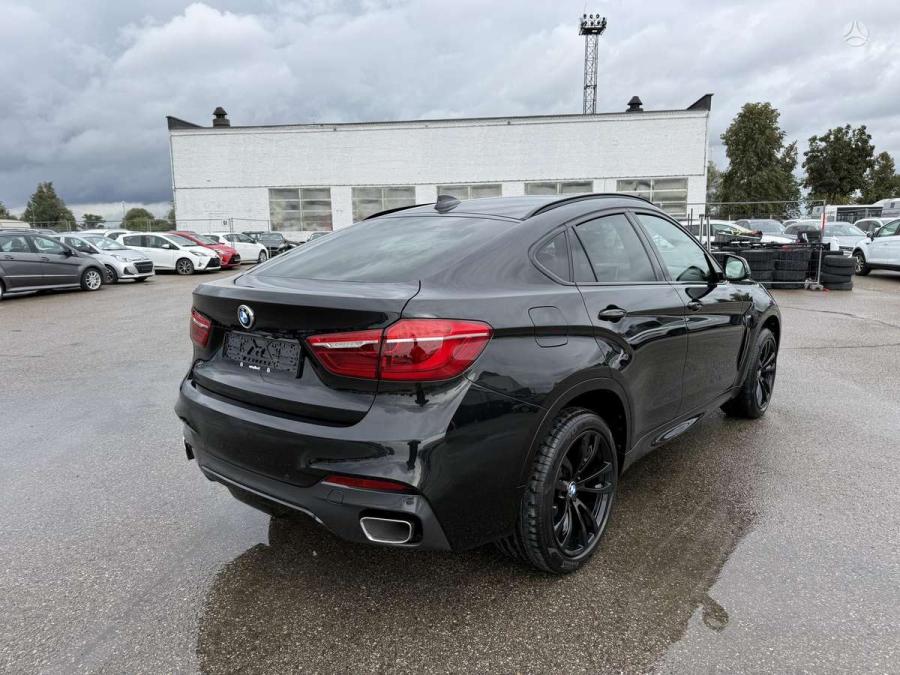 Black BMW X6 2015 in Marijampole, with an engine capacity of 2.99 L and mileage of 180 thousand km for 25500 €, photo 9 on AUTOMOTO.COM.LV