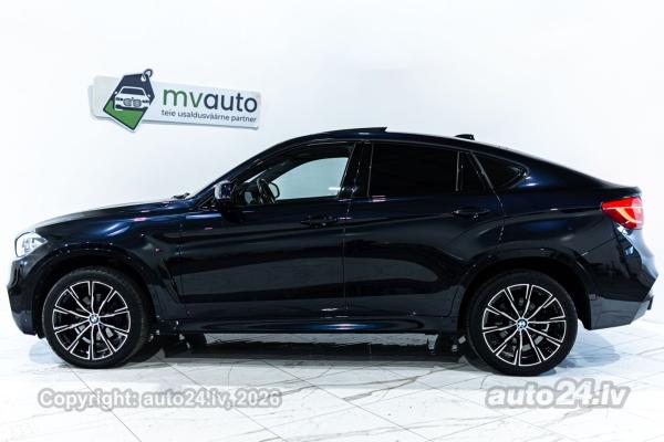 Melns BMW X6 2015 Tallina, ar dzinēja tilpumu 3.00 L un nobraukumu 200 tūkst. km par 23990 €, foto 10 vietnē AUTOMOTO.COM.LV