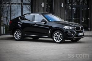 Black BMW X6 2016 in Tukums, with an engine capacity of 3.00 L and mileage of 290 thousand km for 18900 €, photo 2 on AUTOMOTO.COM.LV