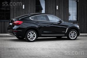 Black BMW X6 2016 in Tukums, with an engine capacity of 3.00 L and mileage of 290 thousand km for 18900 €, photo 3 on AUTOMOTO.COM.LV