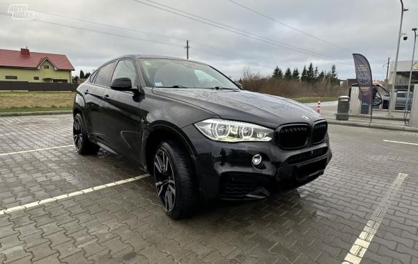 Black BMW X6 2016 in Vilnius, with an engine capacity of 3.00 L and mileage of 196 thousand km for 24400 €, photo 1 on AUTOMOTO.COM.LV