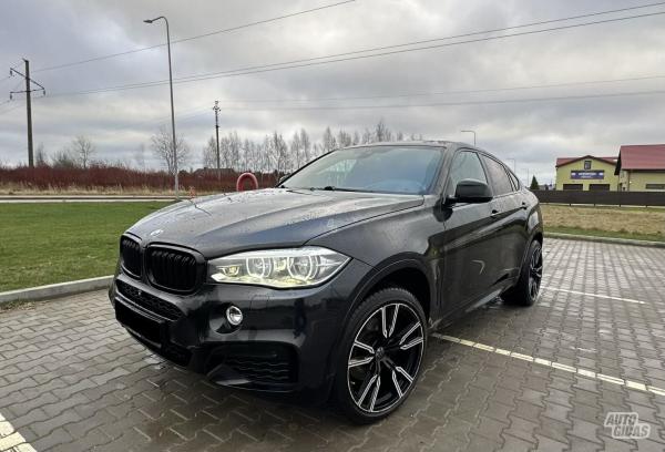 Black BMW X6 2016 in Vilnius, with an engine capacity of 3.00 L and mileage of 196 thousand km for 24400 €, photo 3 on AUTOMOTO.COM.LV