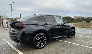 Black BMW X6 2016 in Vilnius, with an engine capacity of 3.00 L and mileage of 196 thousand km for 24400 €, photo 6 on AUTOMOTO.COM.LV