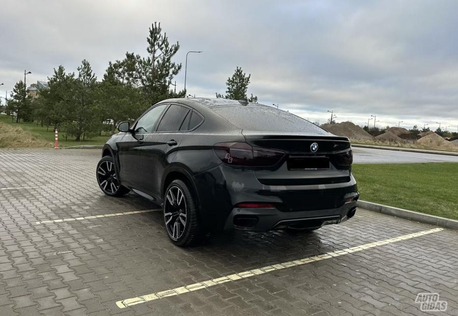 Black BMW X6 2016 in Vilnius, with an engine capacity of 3.00 L and mileage of 196 thousand km for 24400 €, photo 9 on AUTOMOTO.COM.LV