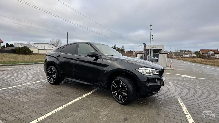 Black BMW X6 2016 in Vilnius, with an engine capacity of 3.00 L and mileage of 196 thousand km for 24400 €, photo 11 on AUTOMOTO.COM.LV