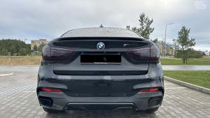 Black BMW X6 2016 in Vilnius, with an engine capacity of 3.00 L and mileage of 196 thousand km for 24400 €, photo 12 on AUTOMOTO.COM.LV