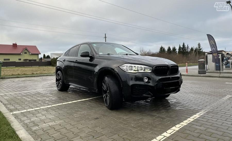 Black BMW X6 2016 in Vilnius, with an engine capacity of 3.00 L and mileage of 196 thousand km for 24400 €, photo 13 on AUTOMOTO.COM.LV