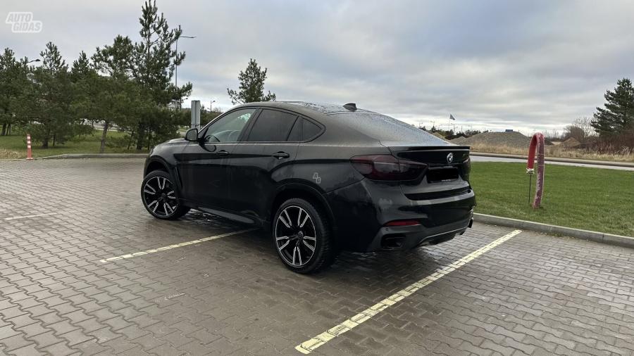 Black BMW X6 2016 in Vilnius, with an engine capacity of 3.00 L and mileage of 196 thousand km for 24400 €, photo 15 on AUTOMOTO.COM.LV