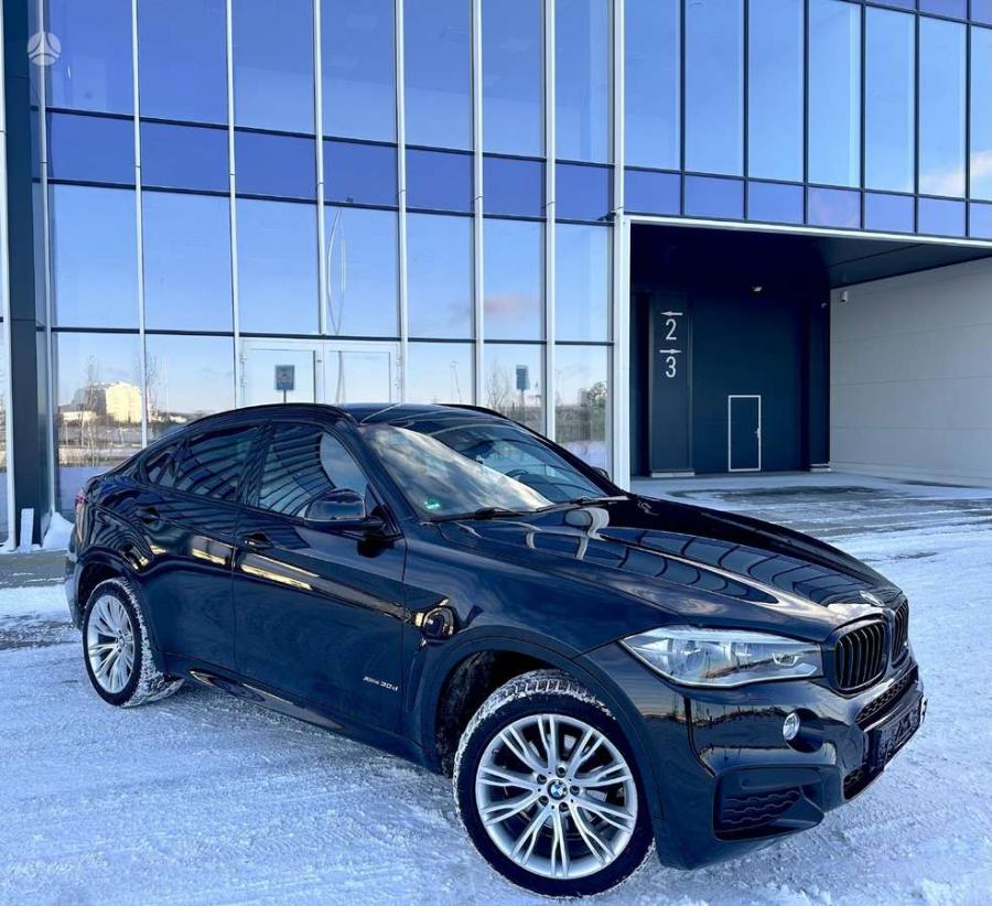 Black BMW X6 2016 in Vilnius, with an engine capacity of 2.99 L and mileage of 260 thousand km for 24700 €, photo 6 on AUTOMOTO.COM.LV